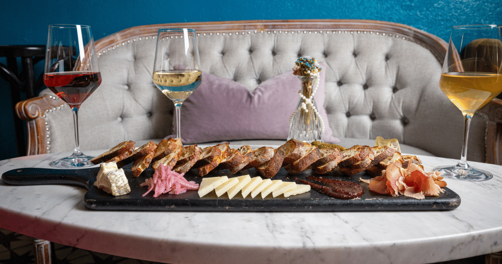 Sip on at Killer Queen Wine Bar + More Triangle Hot Spots